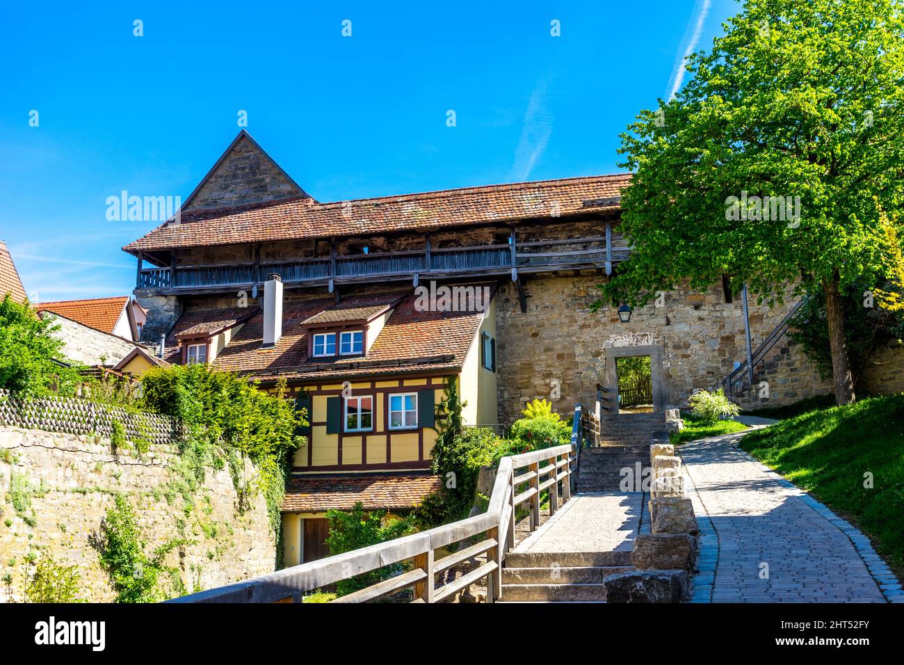 Spectacular view of the medieval half-timbered house against blue sky ...