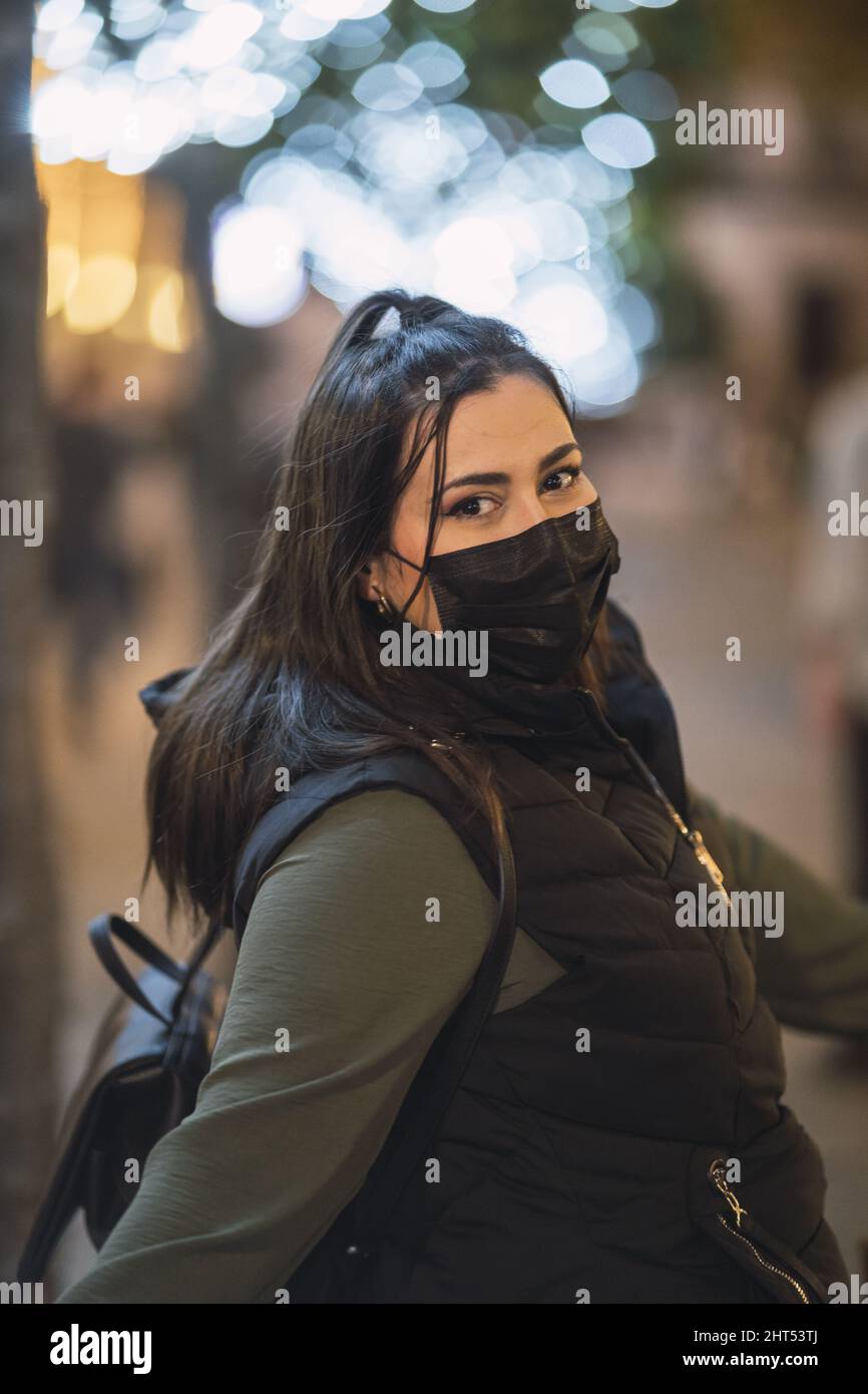 Spanish woman wearing facemask in a streets of Spain Stock Photo - Alamy