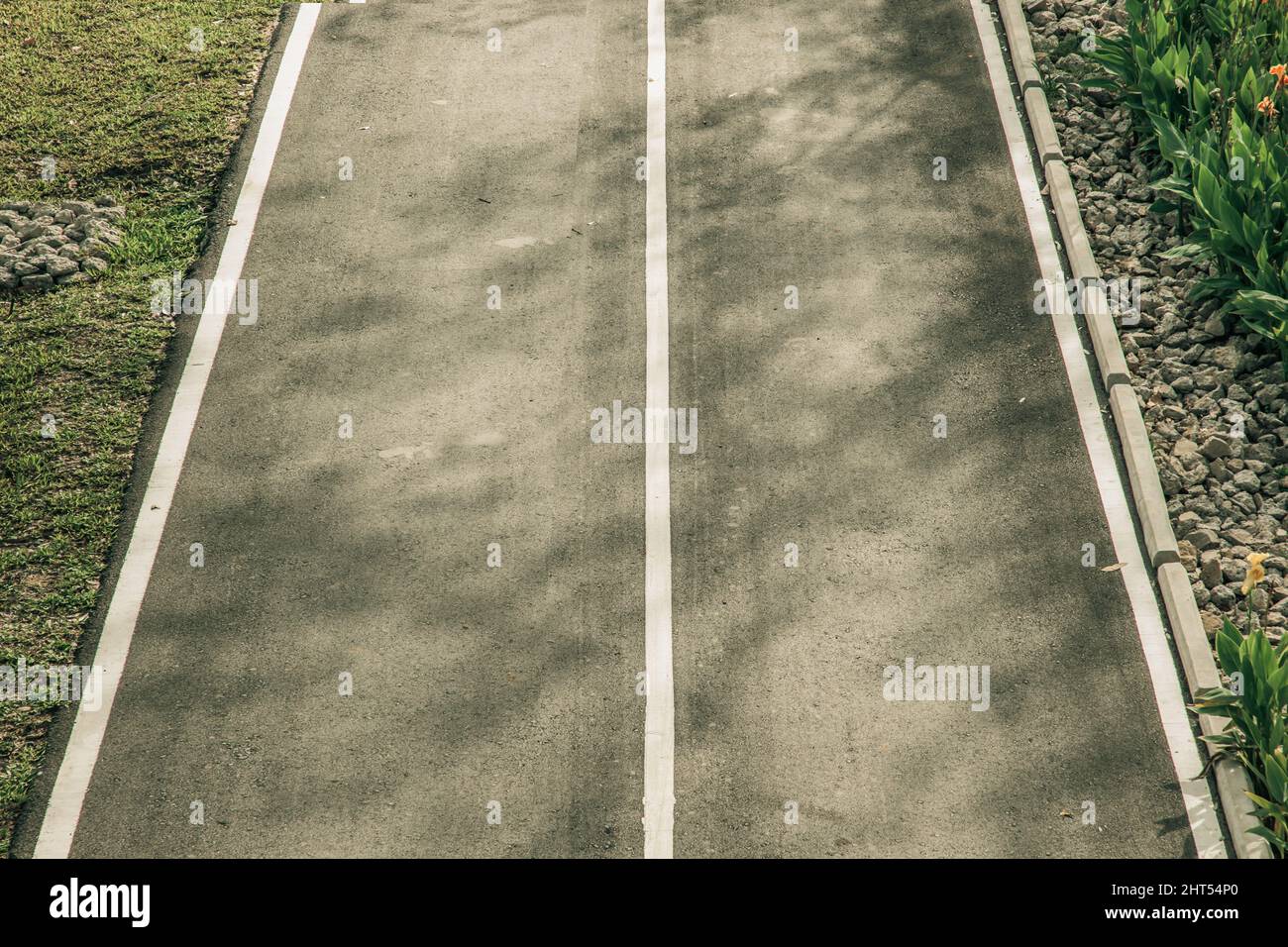Top view of empty road texture with straight lines in white line on ...