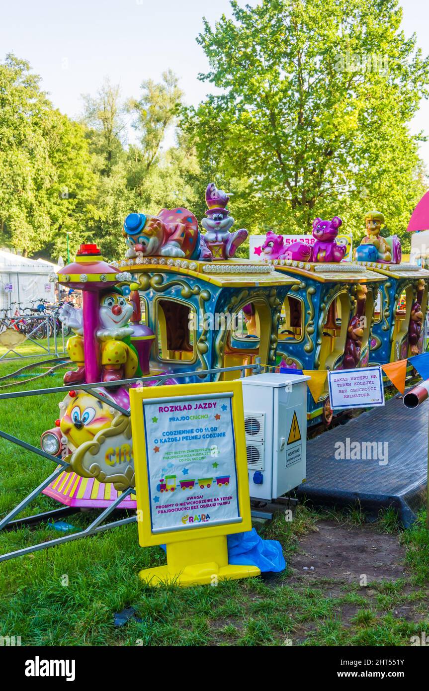 Colorful train attraction on track in the Frajda park Stock Photo - Alamy