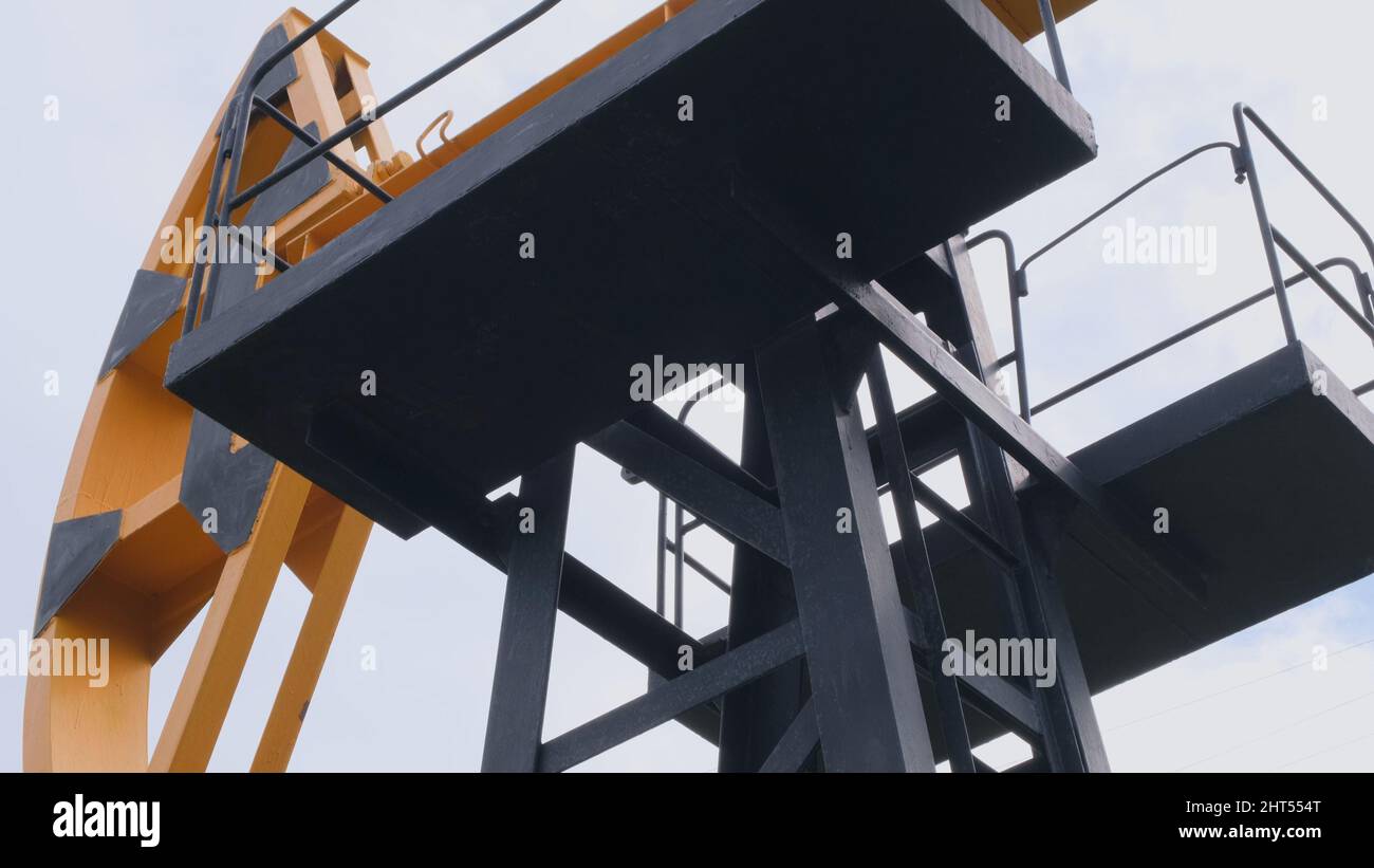 Oil rocking chair in Russia. The concept of oil production, refining ...