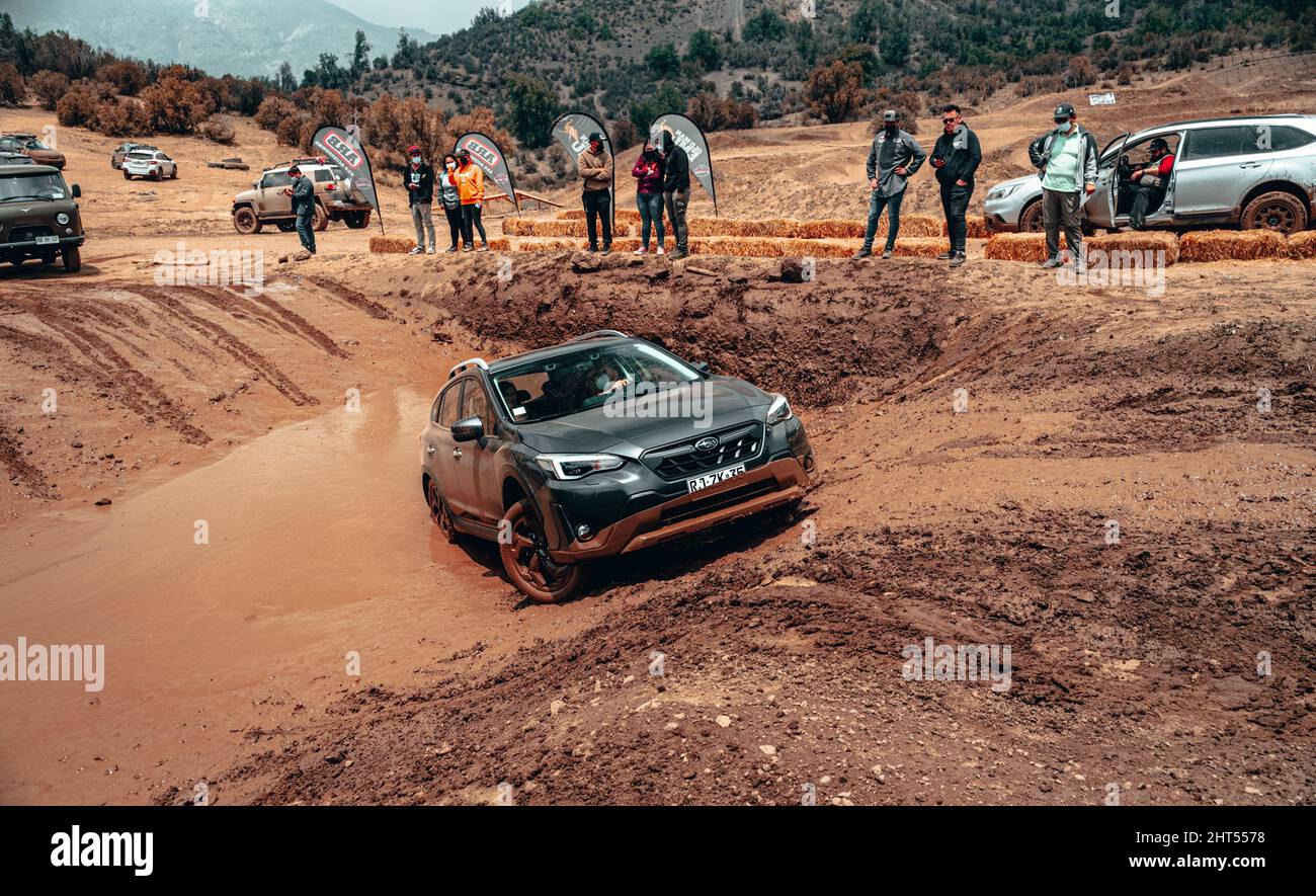 Offroad Subaru vehicle passing obstacles on the ground on an offroad ...