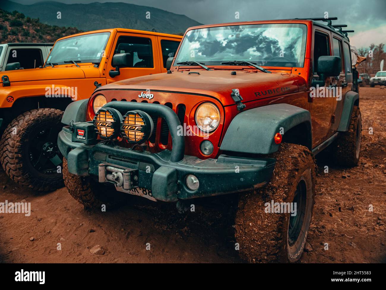 Offroad vehicle passing obstacles on the ground on an offroad course ...