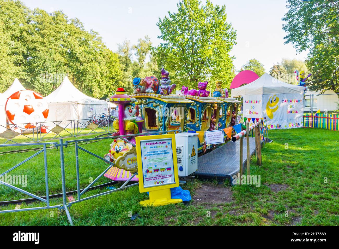 Colorful train attraction on track in the Frajda park Stock Photo - Alamy