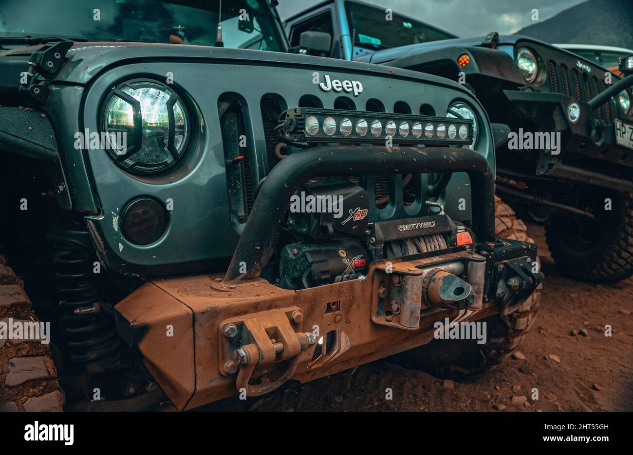 Offroad Jeep vehicle passing obstacles on the ground on an offroad ...