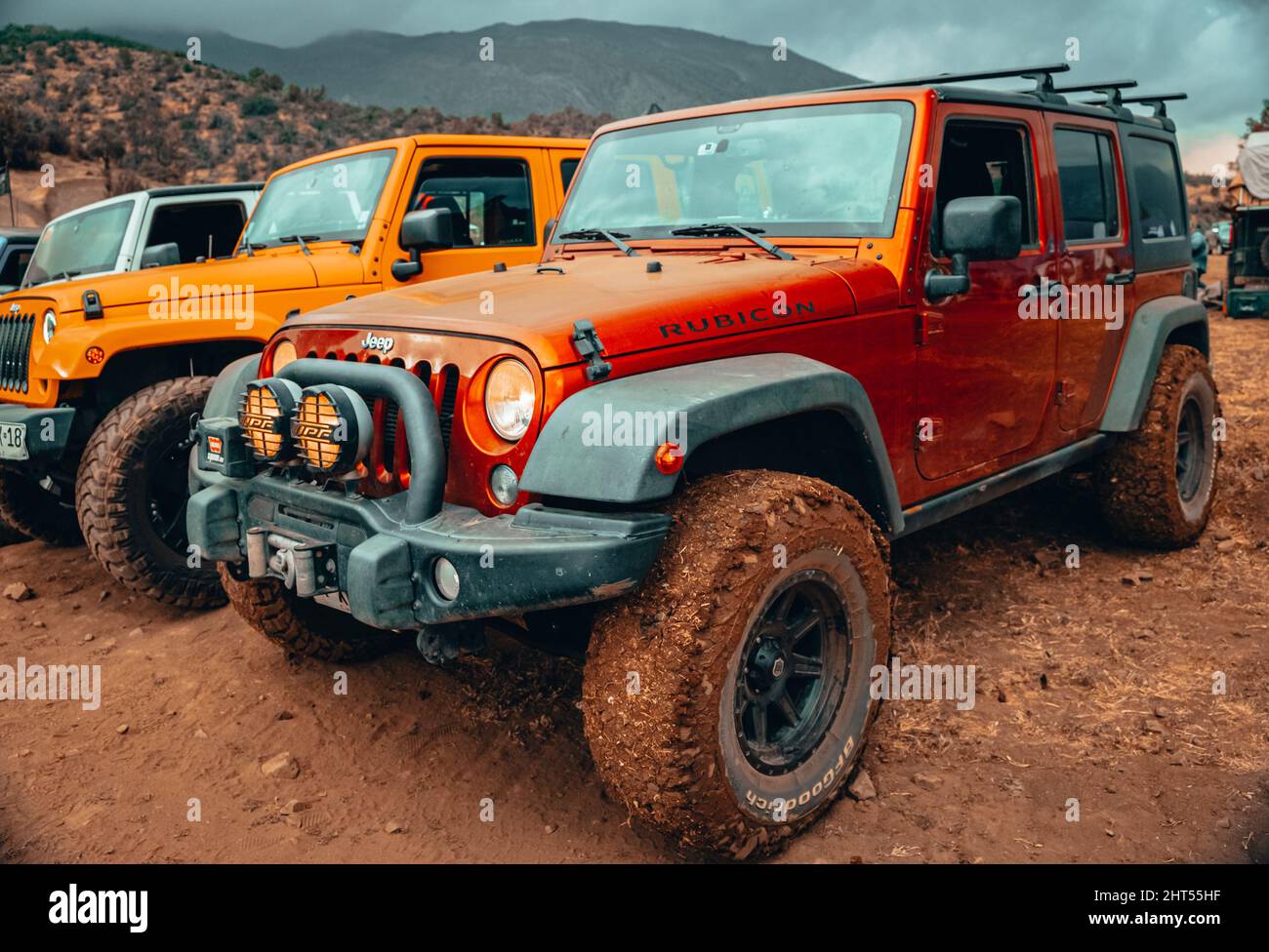 Offroad Jeep vehicle passing obstacles on the ground on an offroad ...
