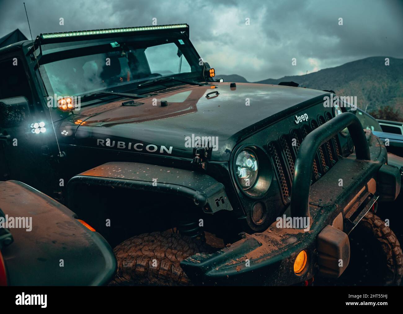 Offroad vehicle passing obstacles on the ground on an offroad course ...