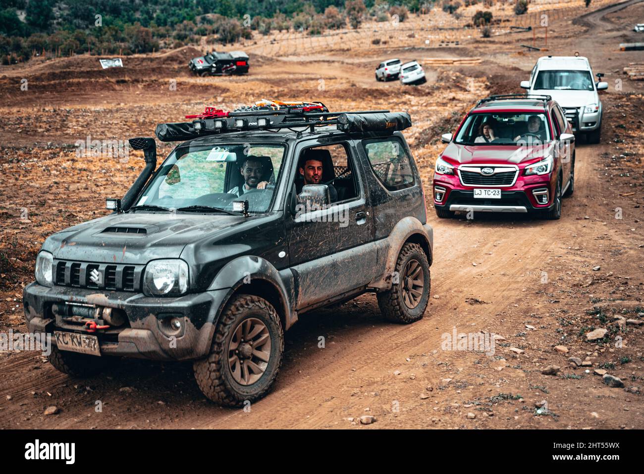 Offroad vehicle passing obstacles on the ground on an offroad course ...