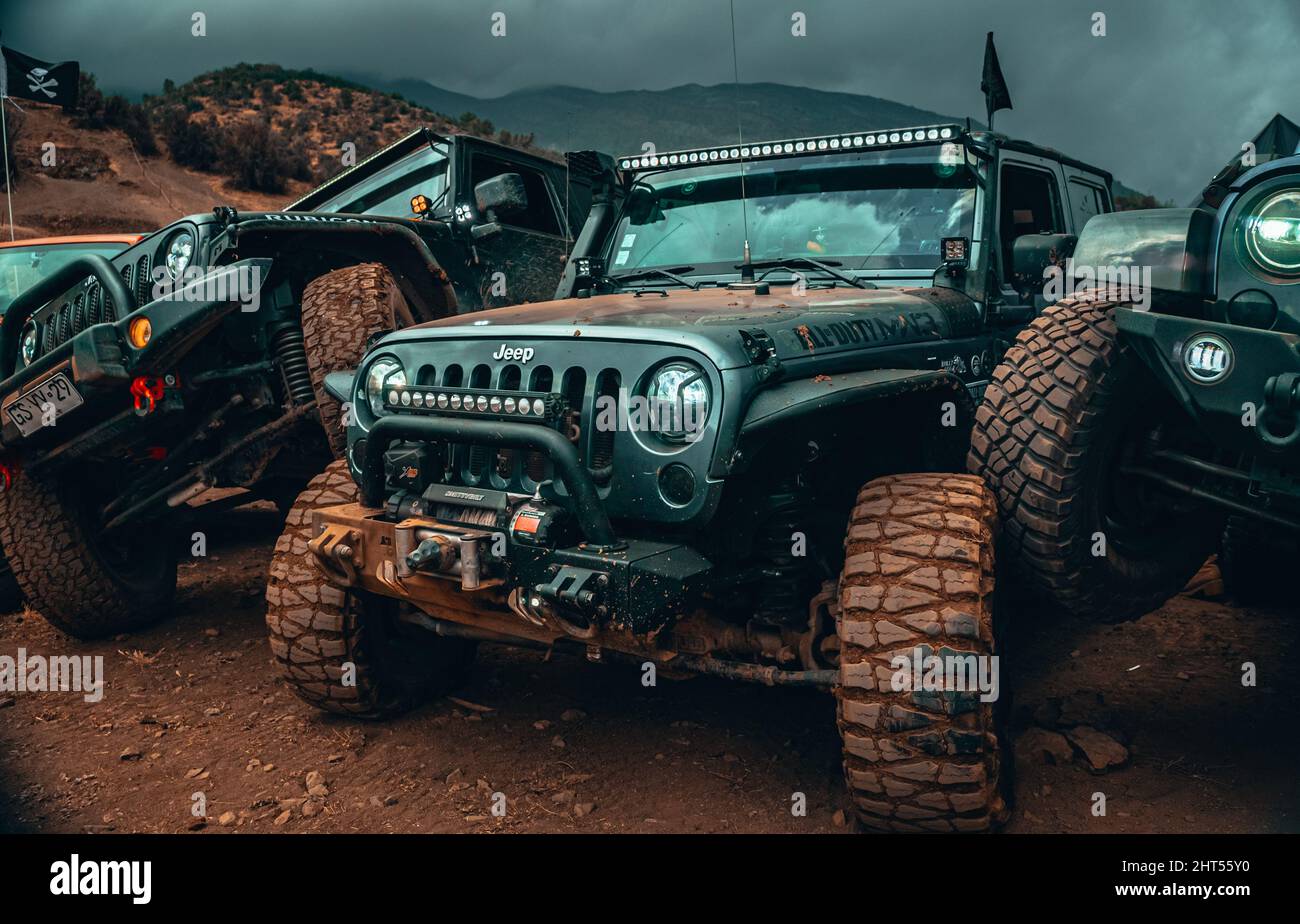 Offroad vehicle passing obstacles on the ground on an offroad course ...