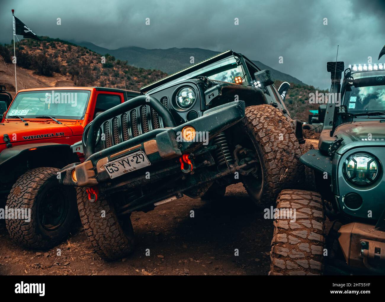 Offroad vehicle passing obstacles on the ground on an offroad course ...