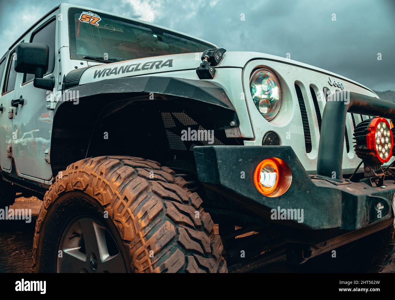 Offroad vehicle passing obstacles on the ground on an offroad course ...