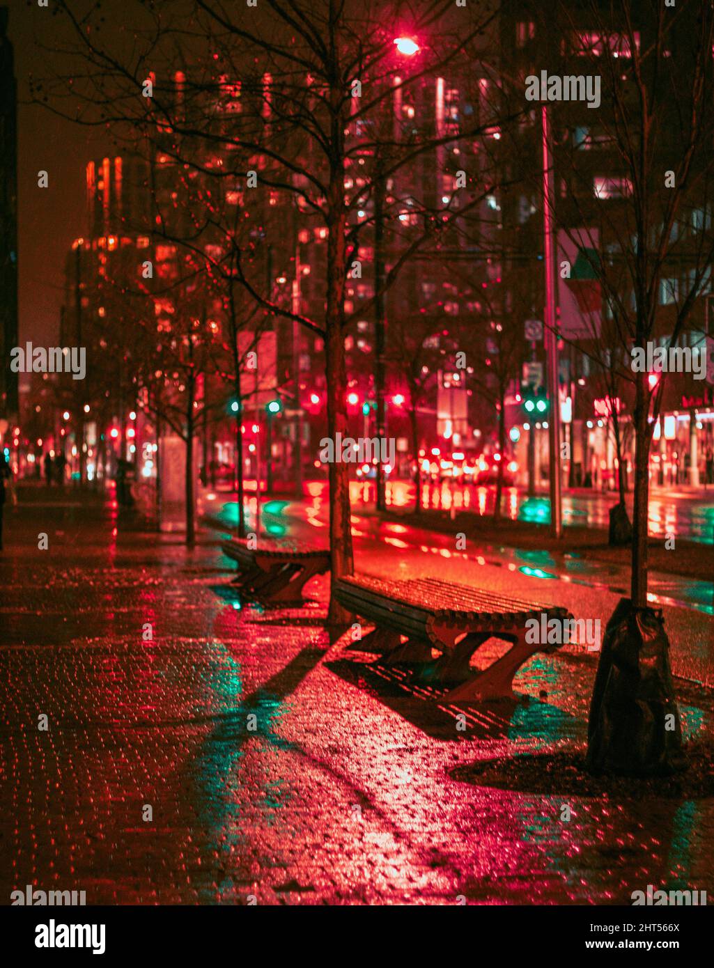 Beautiful shot of sidewalk at night in a city Stock Photo - Alamy