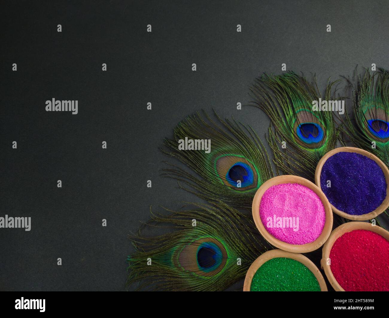 colorful powders for holi on clay pots on occasion of indian festival ...