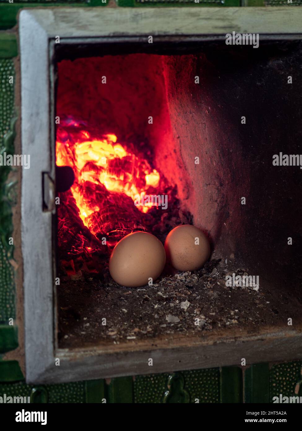 An open stove with cooking eggs Stock Photo - Alamy
