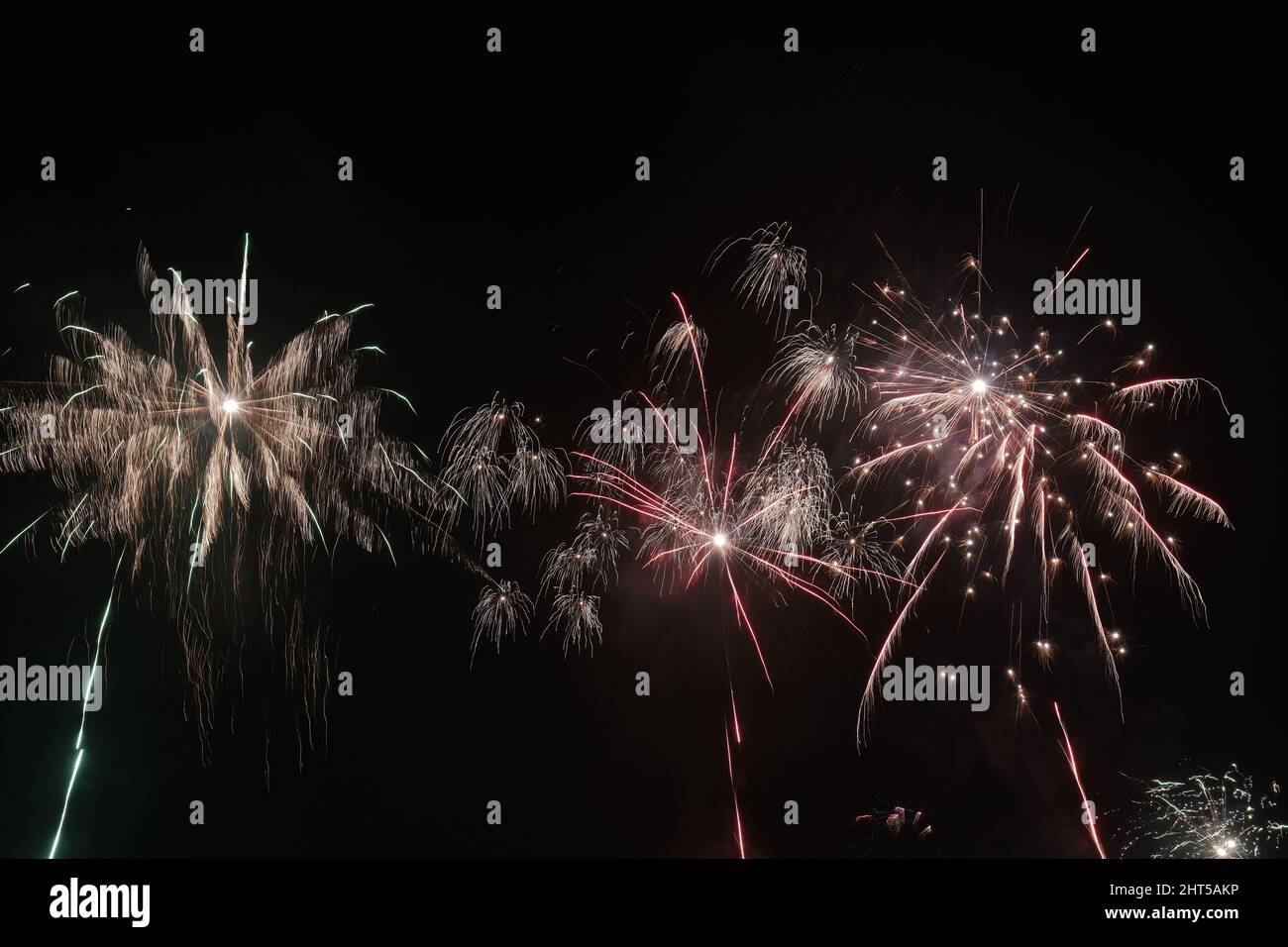 Beautiful fireworks in the night sky Stock Photo - Alamy