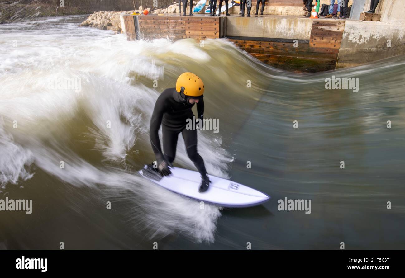 Nuremberg, Germany. 26th Feb, 2022. A surfer rides a surfboard on the ...