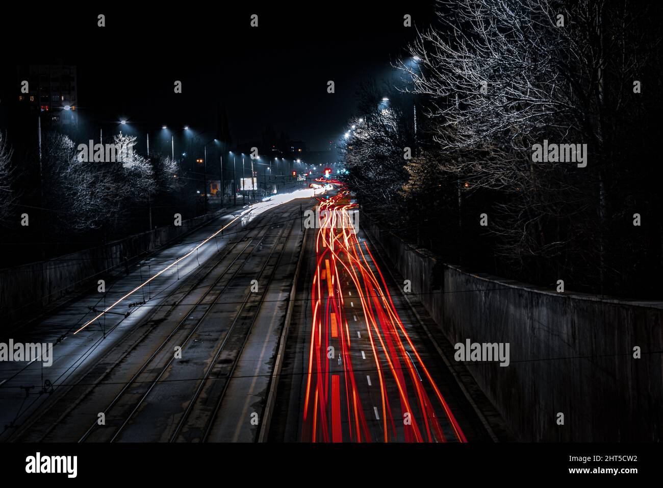Night photo from high bridge showing red lights of cars Stock Photo - Alamy