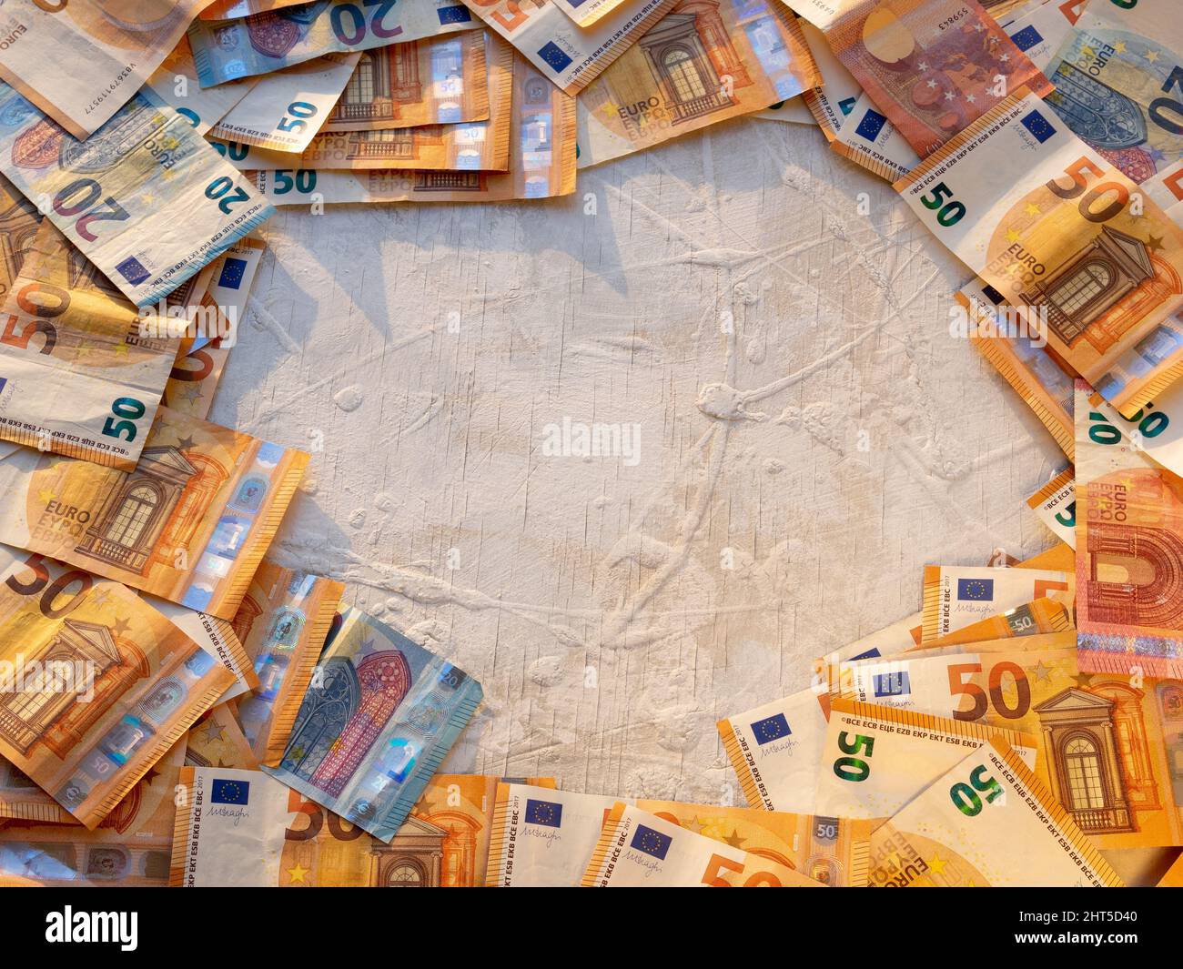 White surface with a circle of Euro banknotes and copy space Stock ...