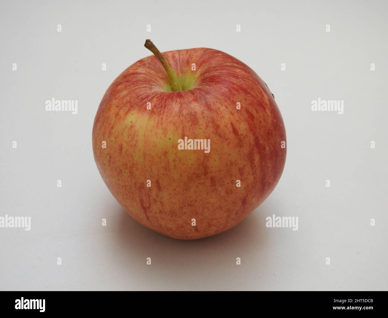 Closeup of a ripe apple isolated on a white background Stock Photo - Alamy