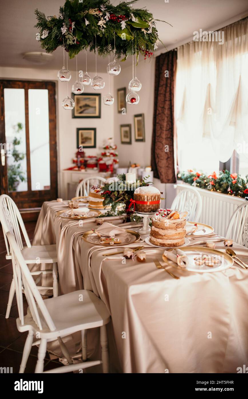 Christmas table with decorations for family gatherings Stock Photo - Alamy