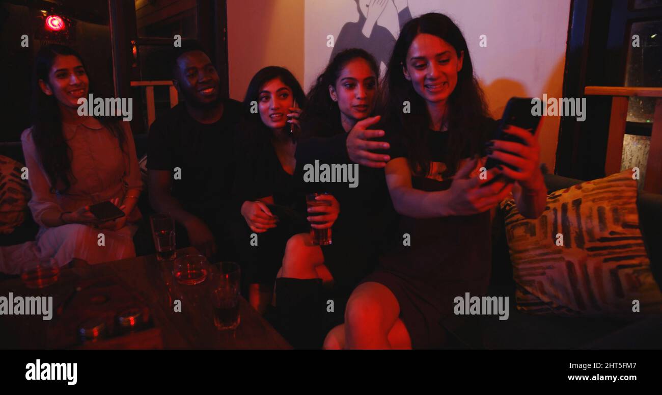 Young people partying at a night club Stock Photo - Alamy