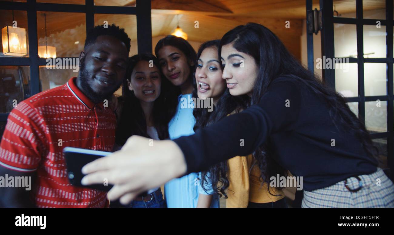 Group of South Asian friends taking a selfie Stock Photo - Alamy