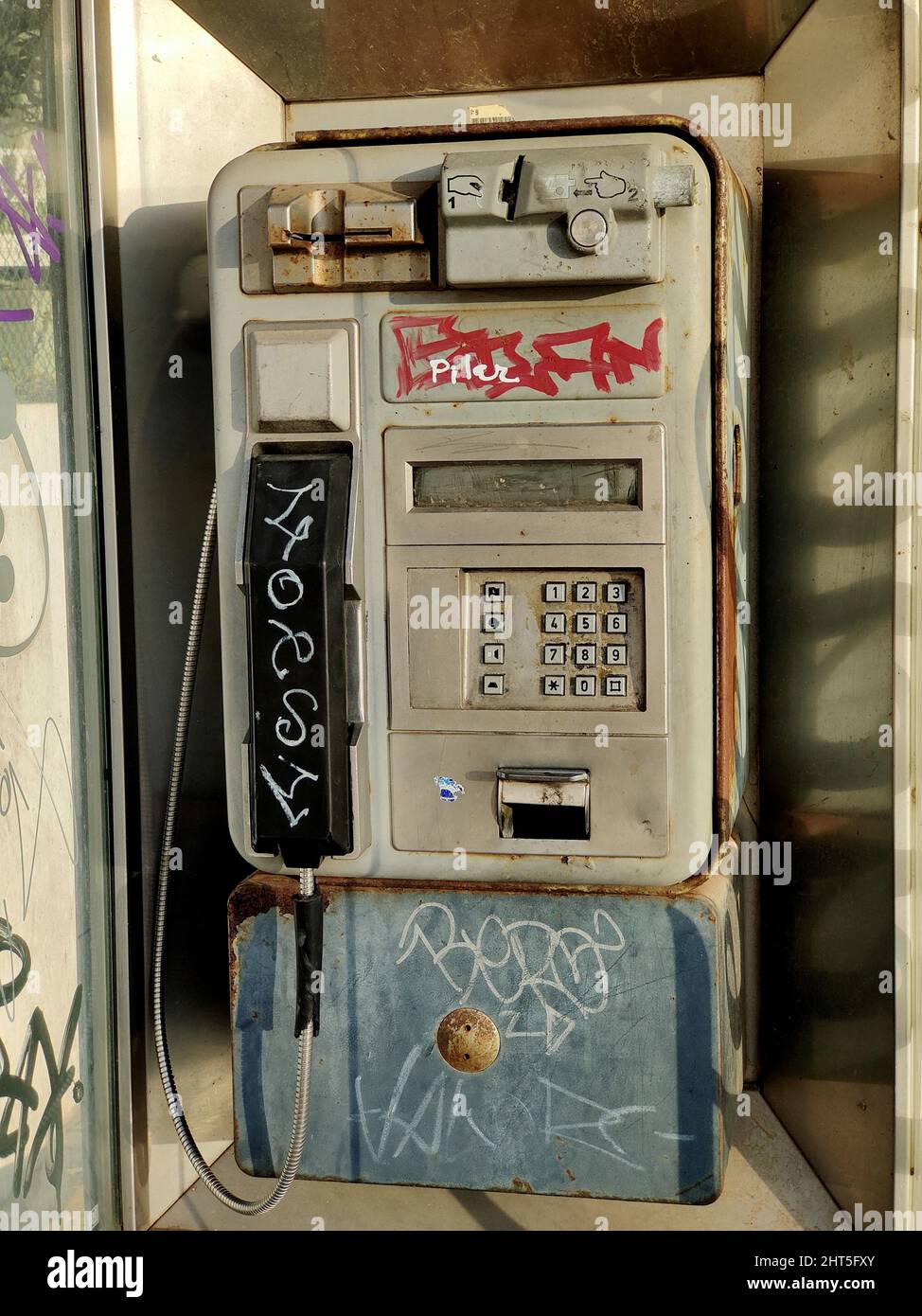 Old phone booth in a square Stock Photo - Alamy