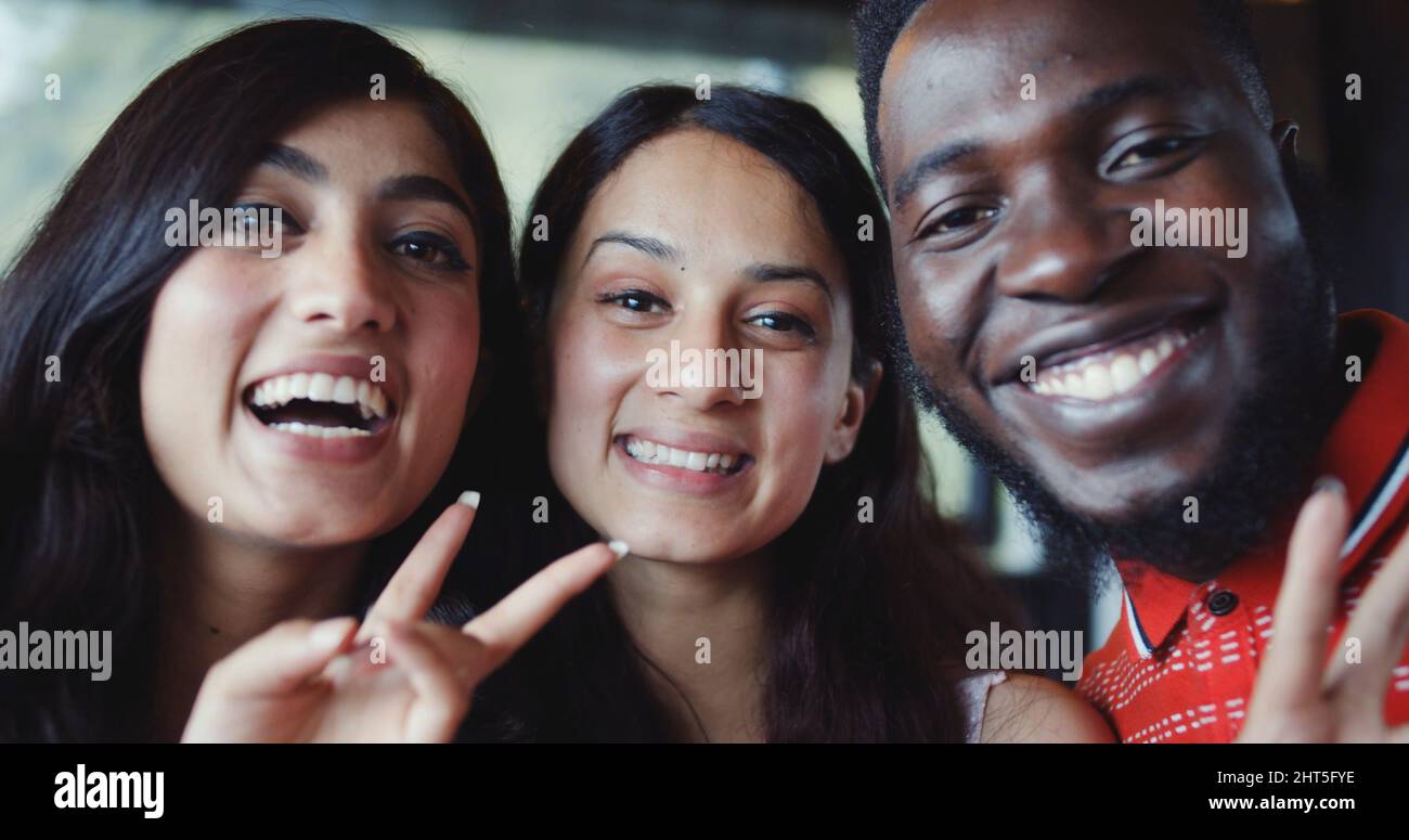 South Asian friends smiling and posing together Stock Photo - Alamy
