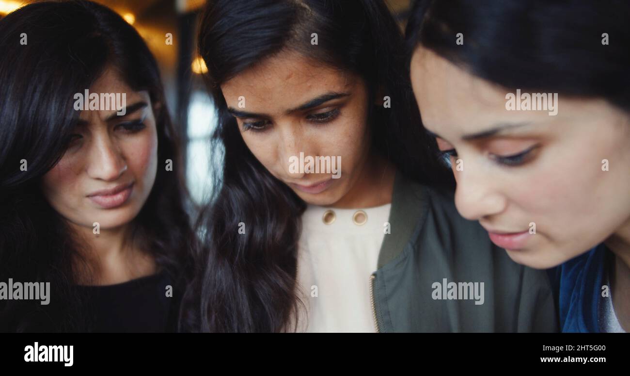 Group of South Asian female friends talking Stock Photo - Alamy