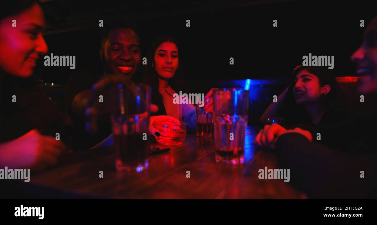 Young people partying at a night club Stock Photo - Alamy