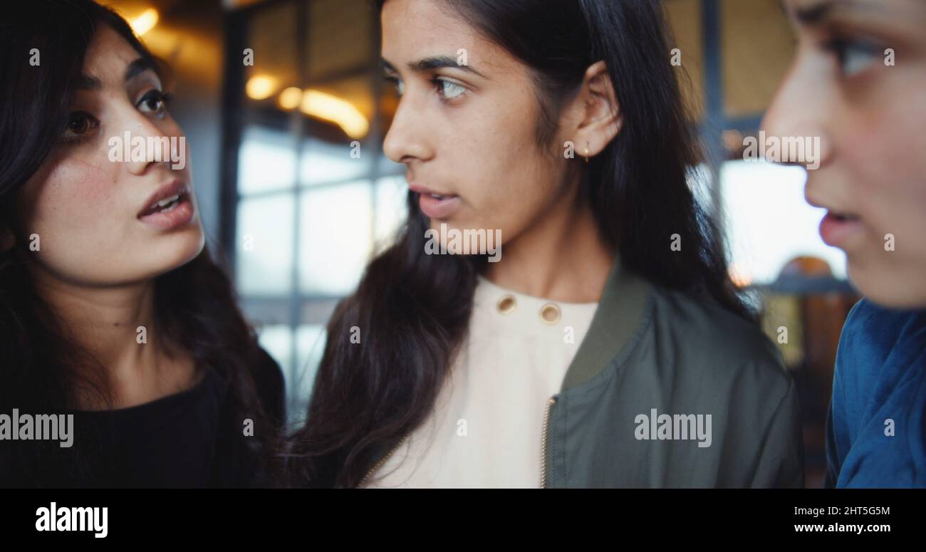 Group of South Asian female friends talking Stock Photo - Alamy