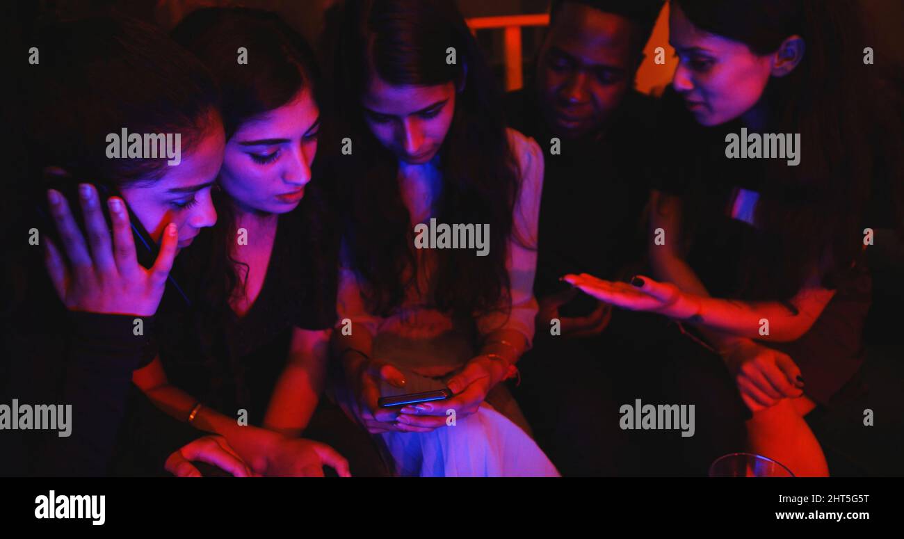 Young people partying at a night club Stock Photo - Alamy