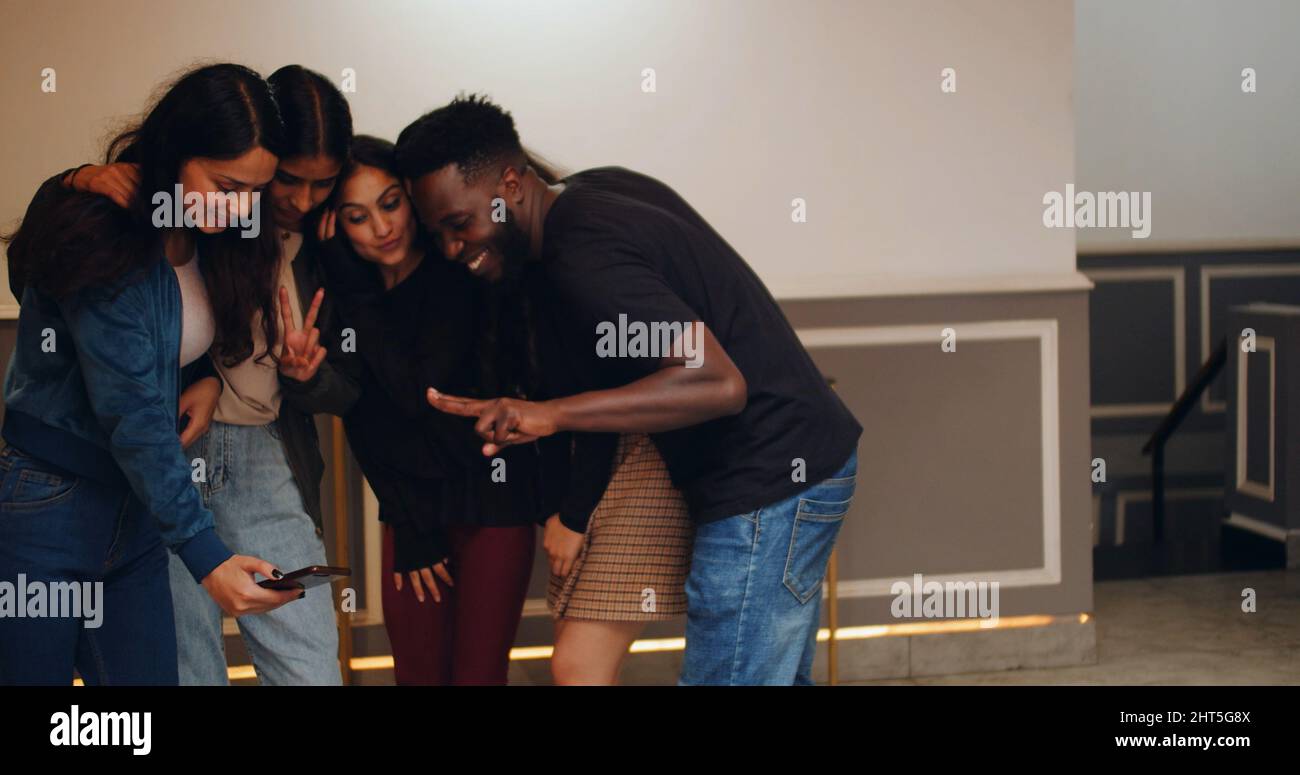 Group of South Asian friends laughing and hugging - friendship concept ...