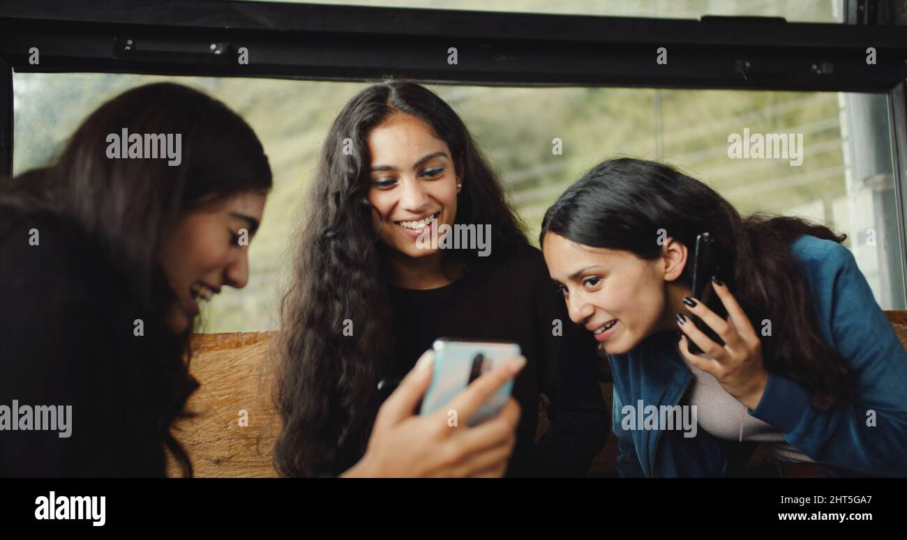 Group of South Asian friends laughing together - friendship concept ...