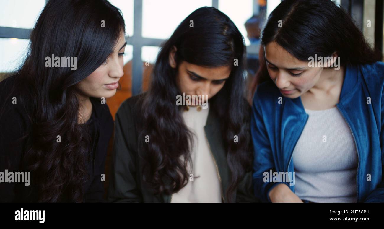 Group of South Asian female friends talking Stock Photo - Alamy