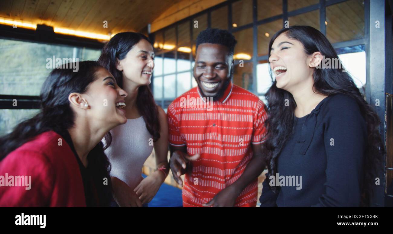 Group of South Asian friends laughing together - friendship concept ...