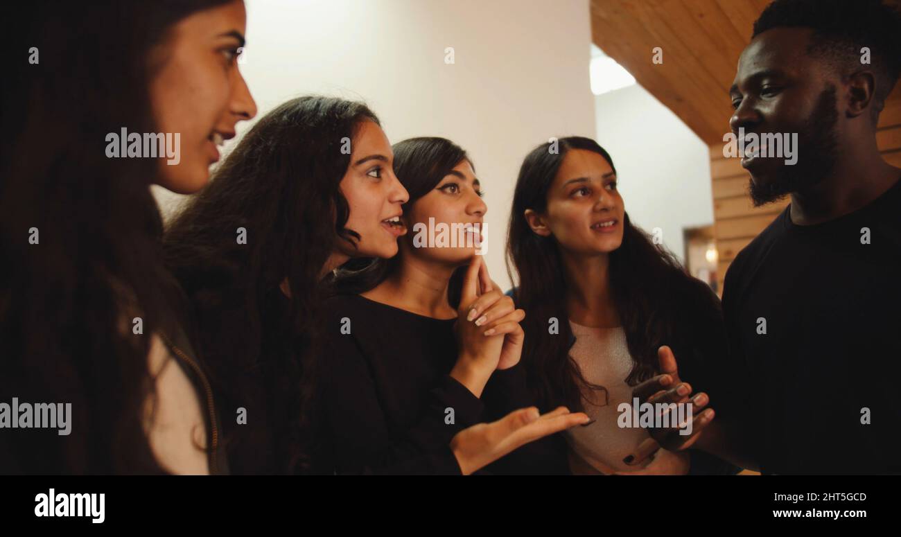 Group of South Asian friends talking together Stock Photo - Alamy