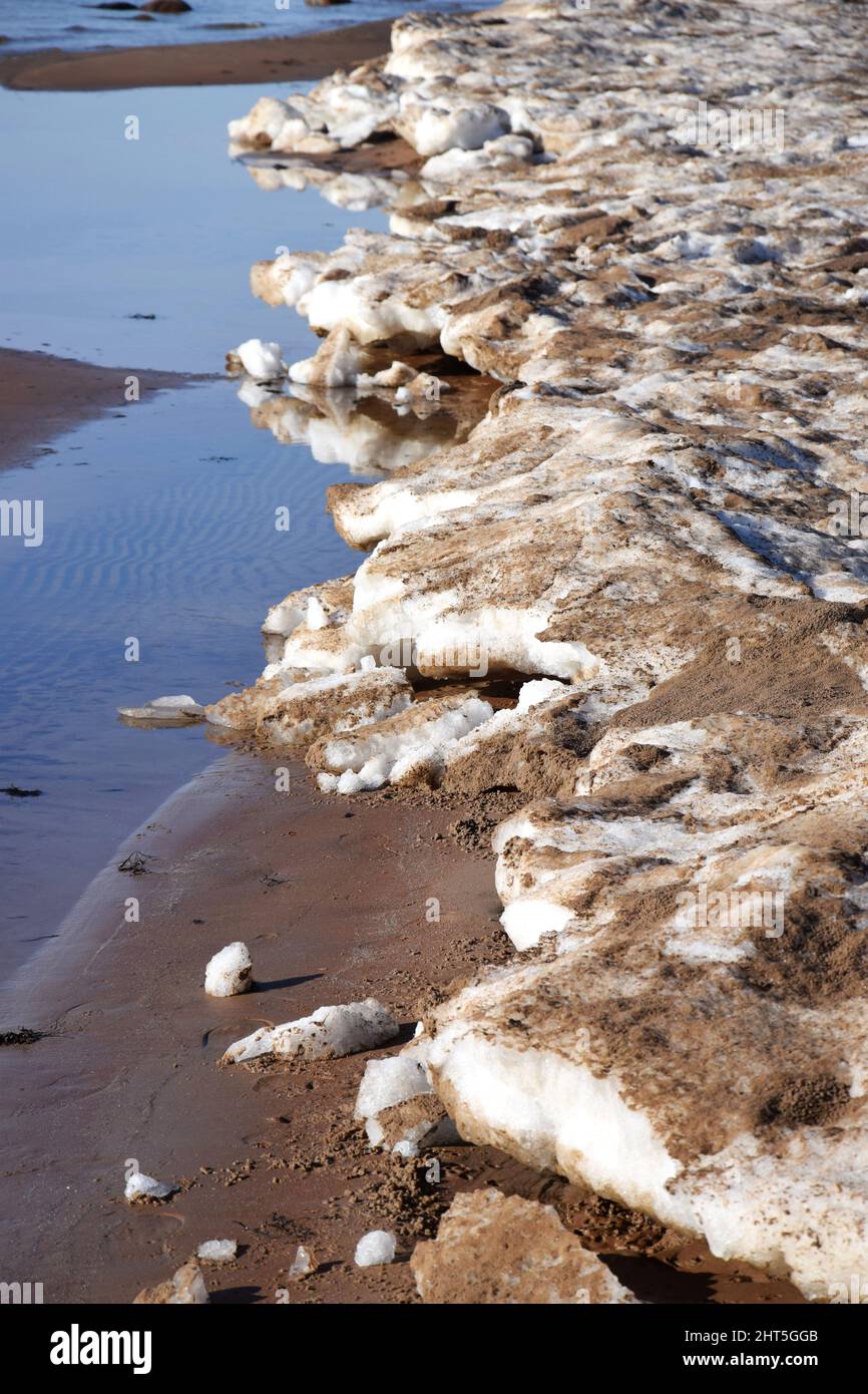 Vertical photo of salt rock formation on a sea shore Stock Photo - Alamy