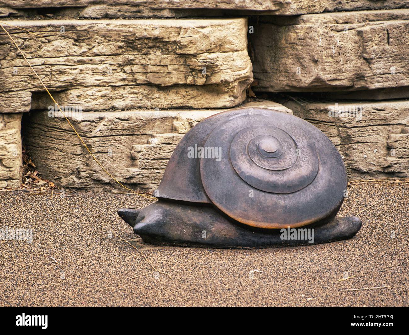 Closeup shot of the Snail statue at Kansas City Zoo in the United ...