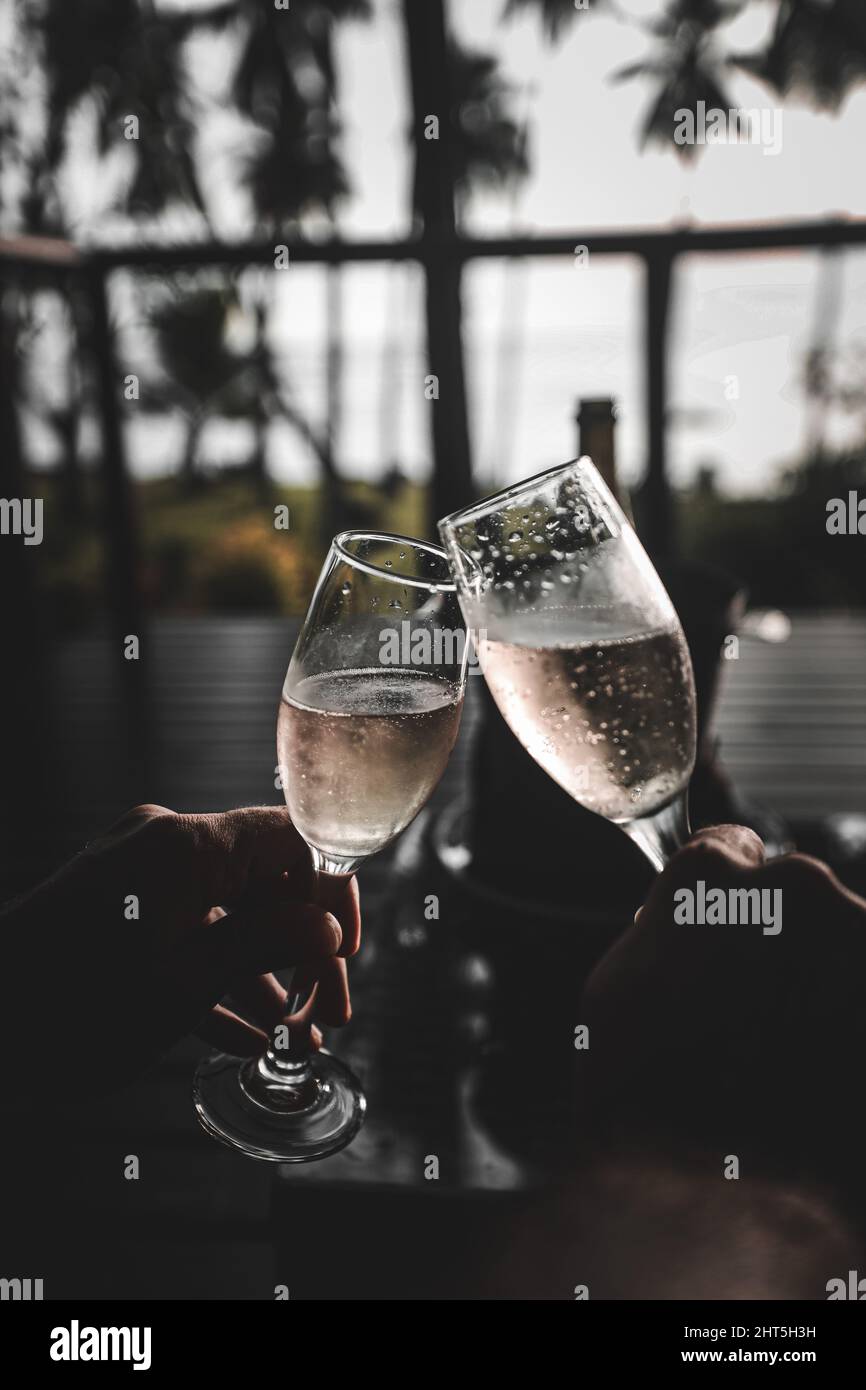Shot glasses clinking hi-res stock photography and images - Alamy