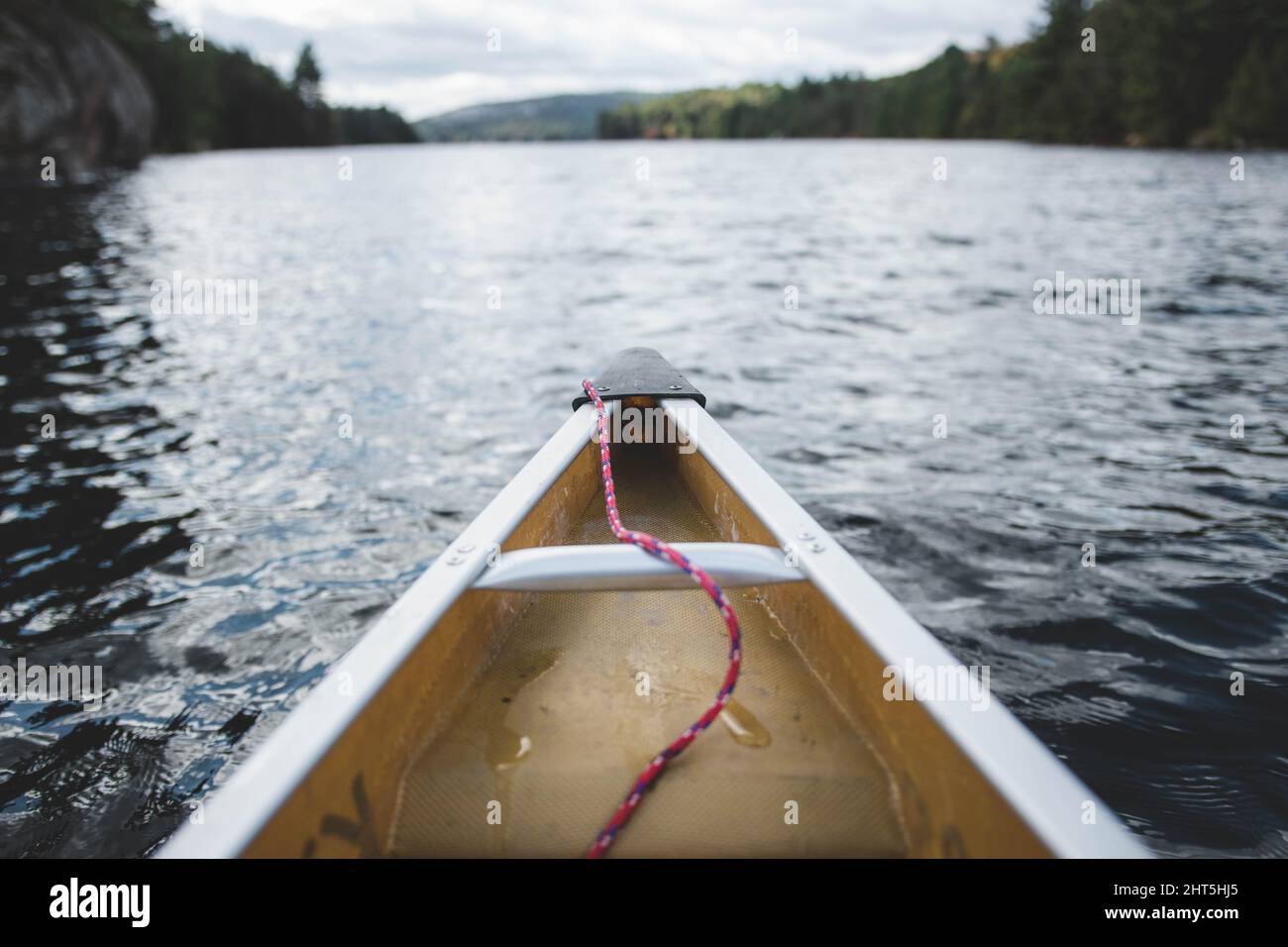 Closeup of a Tip of a canoe on the lake Stock Photo - Alamy
