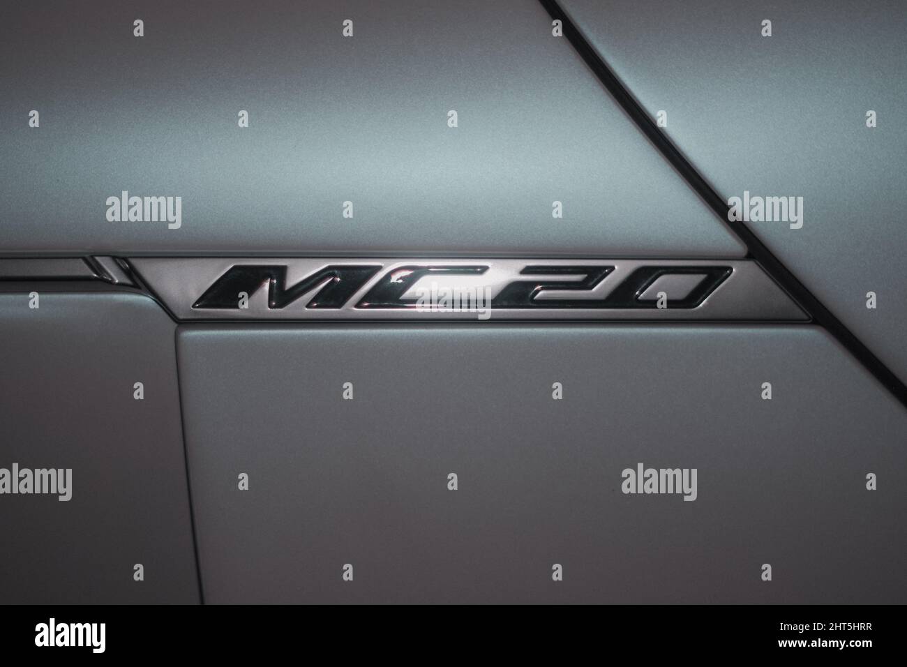 Closeup logo of the maserati MC20 Stock Photo - Alamy