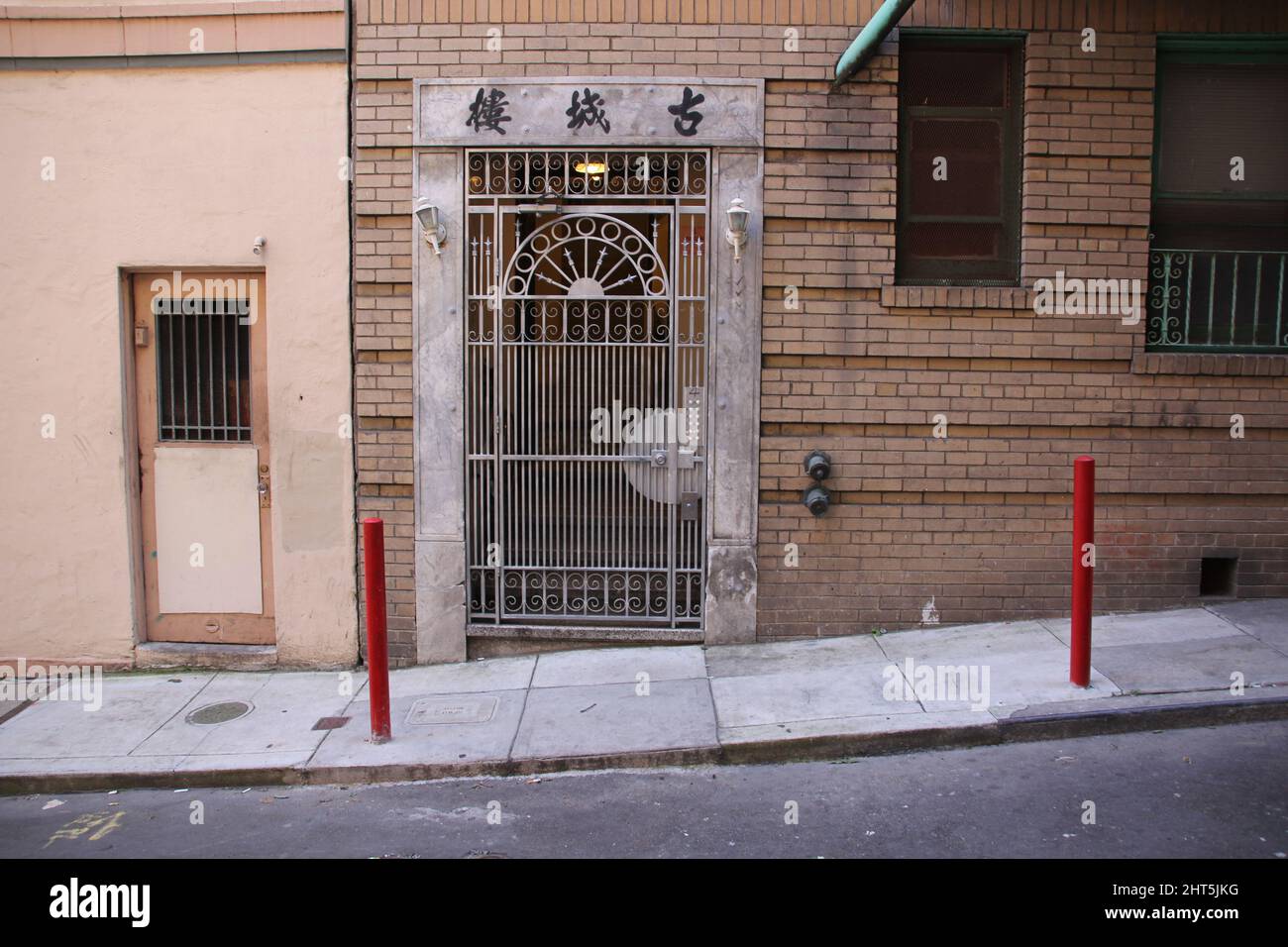 View of door with metal bars on the streets of San Francisco Stock ...