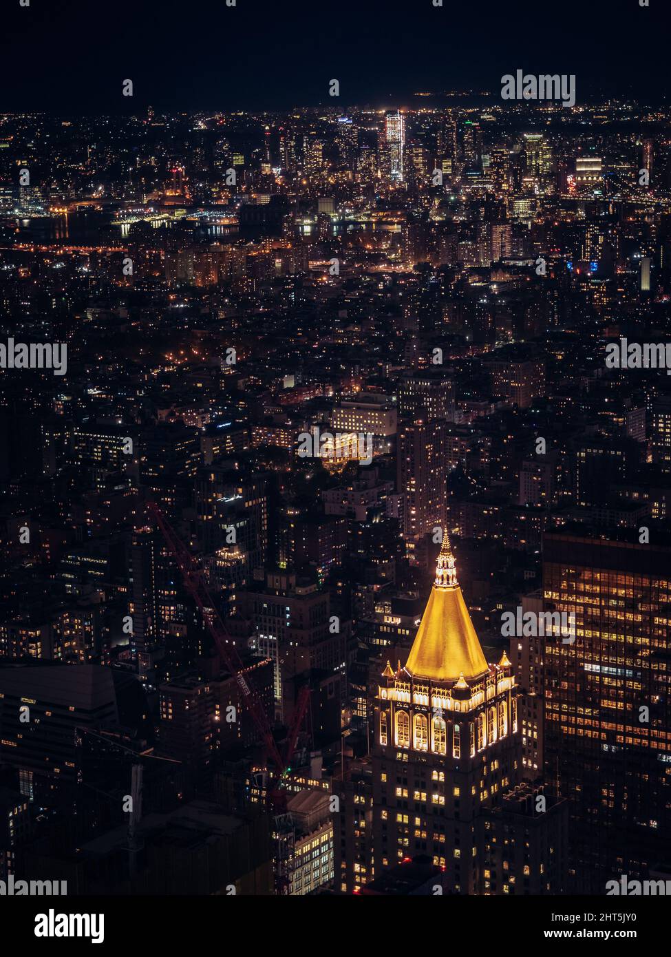 View of New York's famous high-rise building at night Stock Photo - Alamy