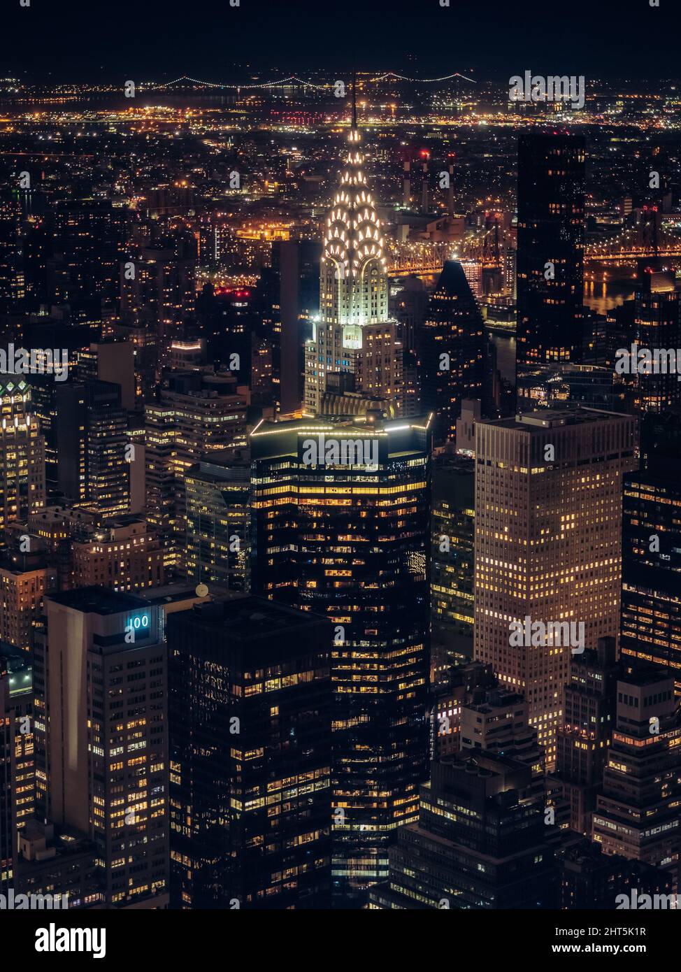 View of New York's famous high-rise building at night Stock Photo - Alamy