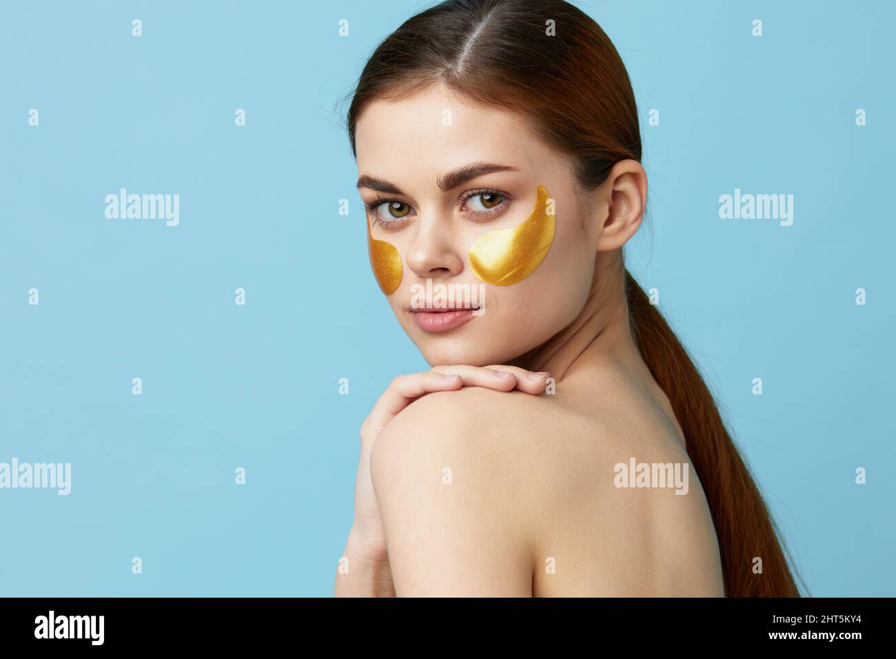 woman golden patches on the face isolated background Stock Photo - Alamy