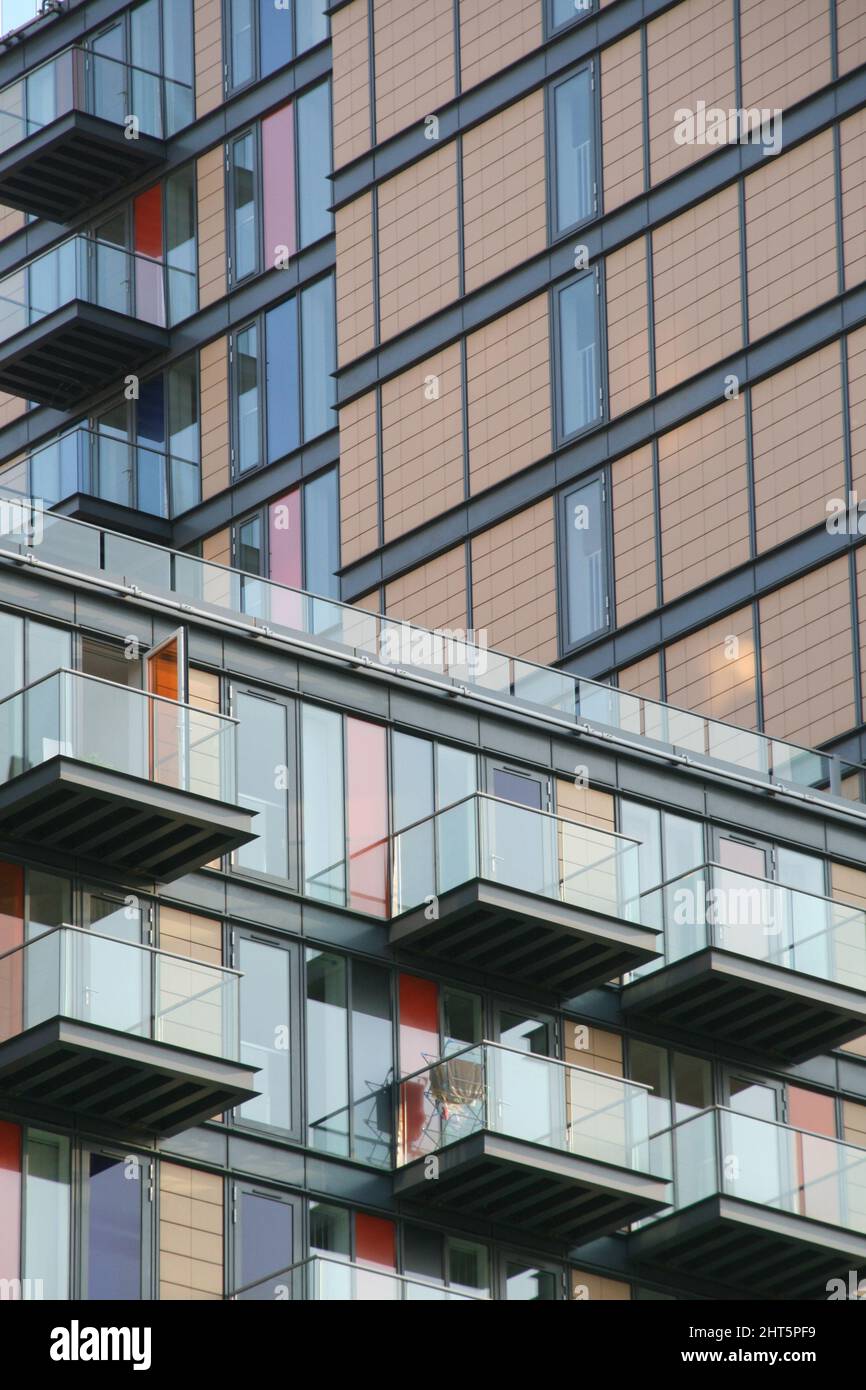Vertical of glass windows and balconies of a modern building in London ...