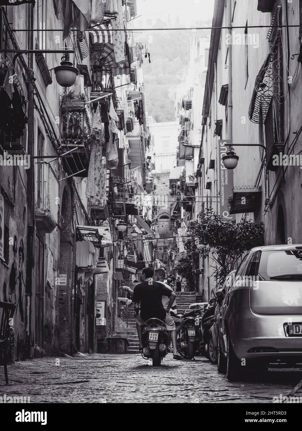 Vertical shot of a narrow street in Naples, Italy Stock Photo - Alamy