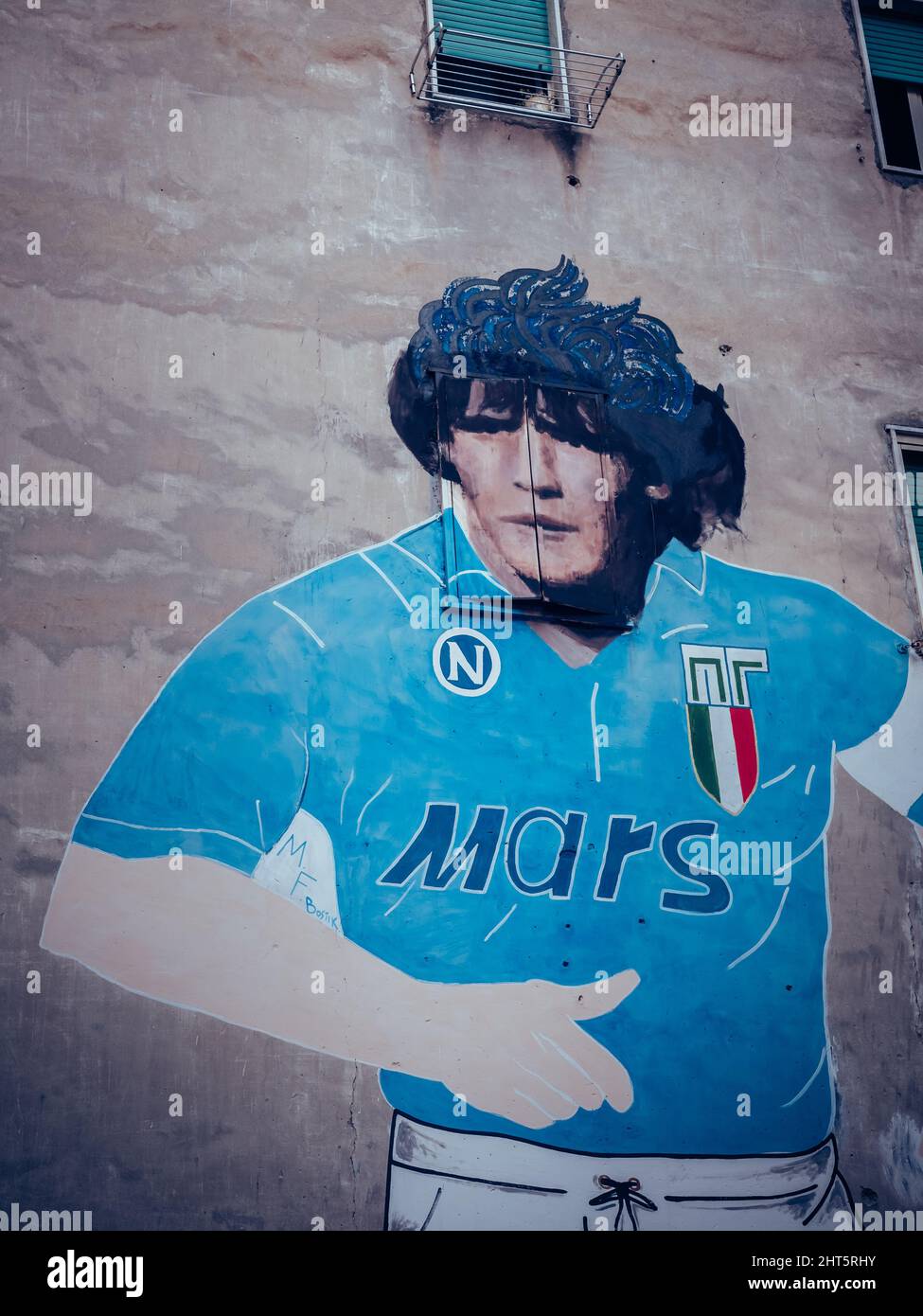 Vertical shot of a mural of Maradona on a wall in Naples, Italy Stock ...