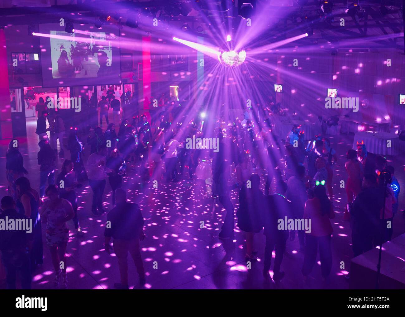 People are dancing in the club with neon lights Stock Photo - Alamy